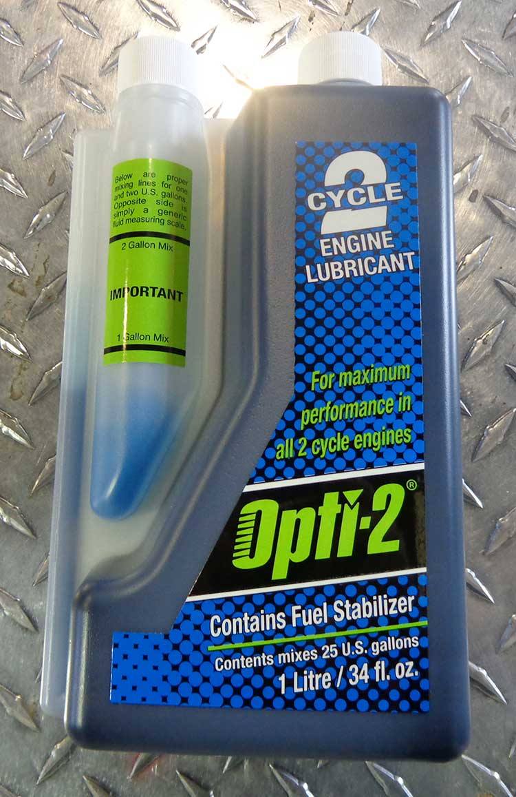 Opti-2 2 Cycle 34 oz Bottle Smokeless Oil Mix 25 Gallons EZ Measure Bo